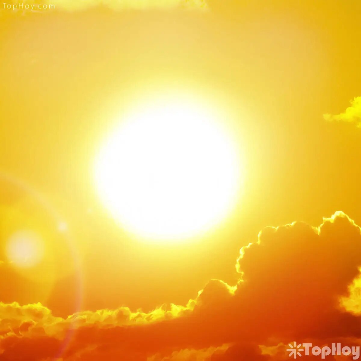 el sol entre las nubes - TopHoy